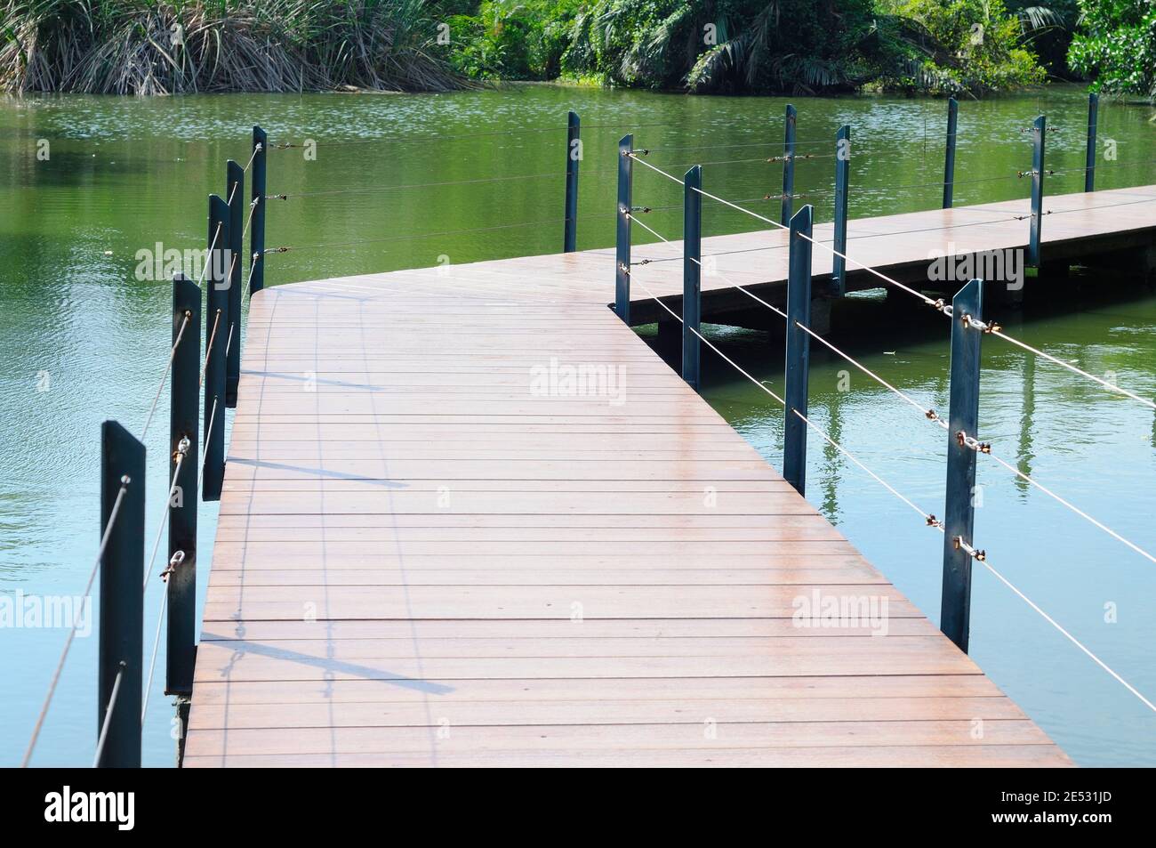 Wooden bridge railings lake nature hi-res stock photography and images ...