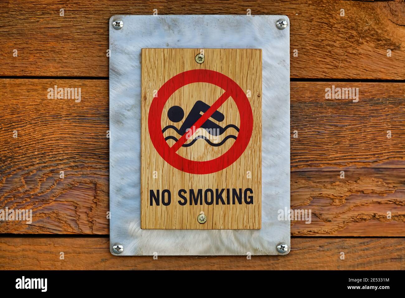 This sign is a little confused. It says no smoking but means no ...