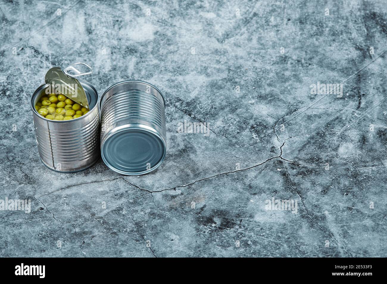 Marinated green pea beans in metallic cans Stock Photo - Alamy