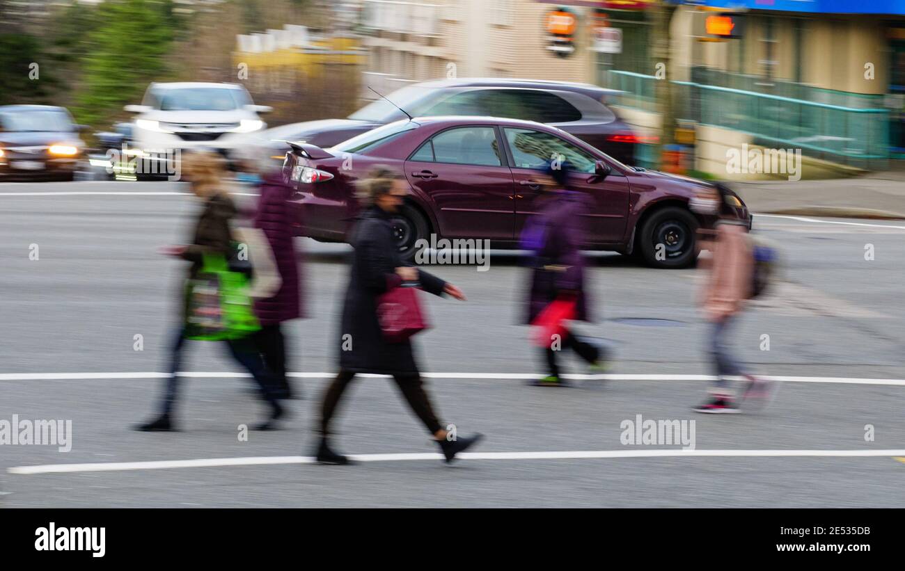 Vancouver, British Columbia, Canada. 7th Jan, 2021. Pedestrian and car ...