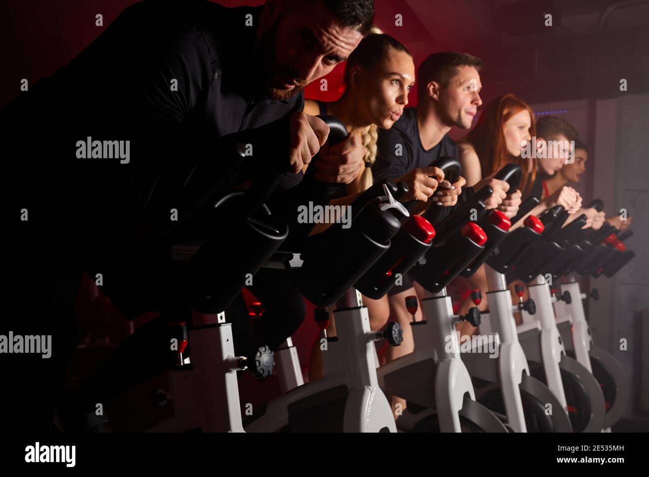 Group team cycling machine hi-res stock photography and images - Alamy