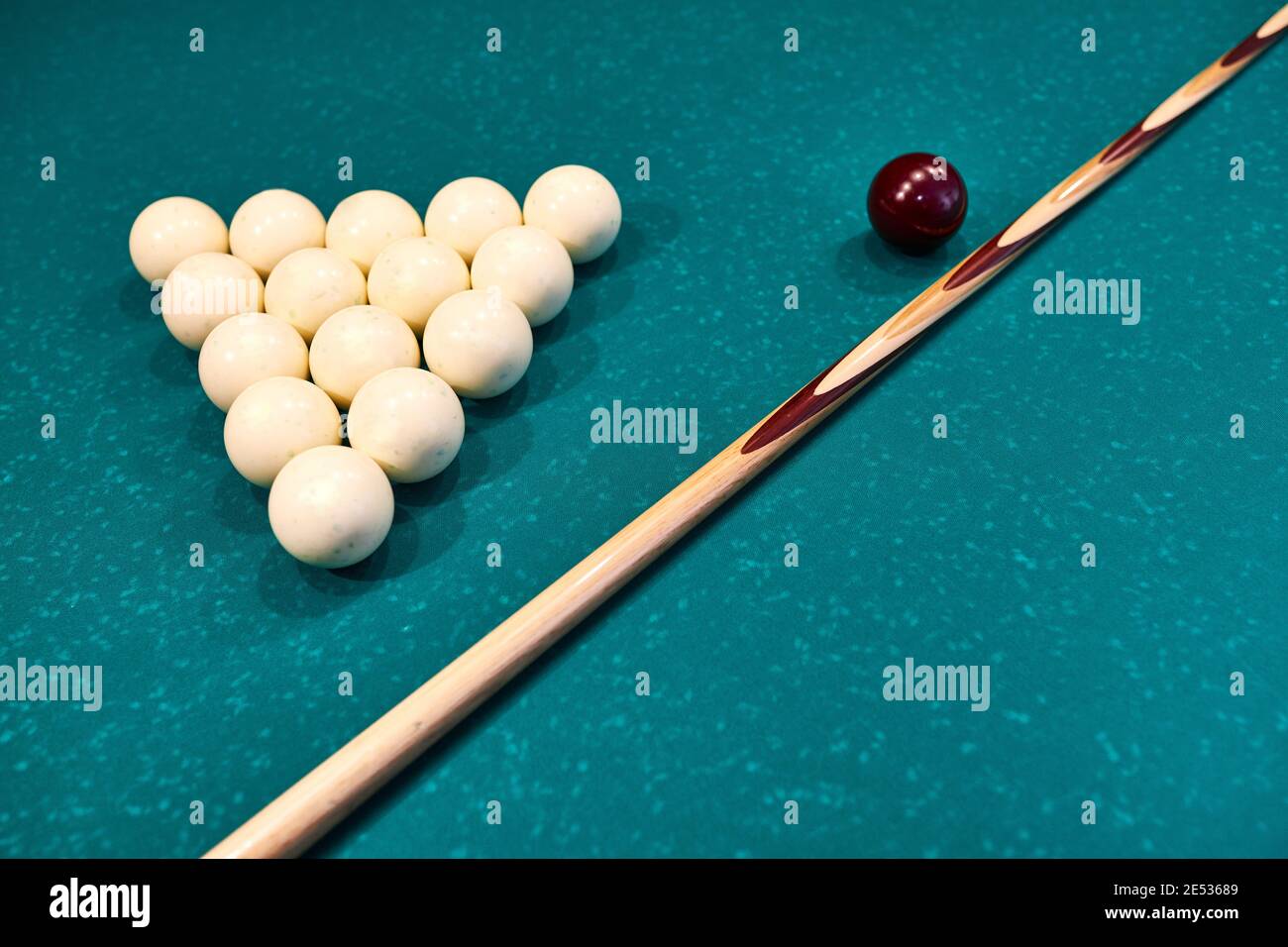 white snooker balls and cue on snooker table. billiards sport game ...