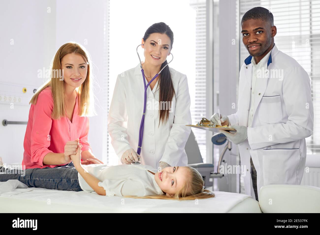 Doctors Working On Patient