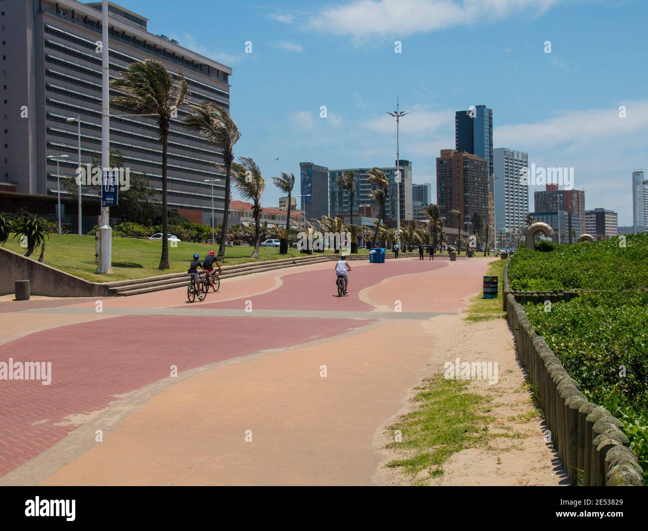 Paved walkway lined with hotels at durban beachfront, south africa ...