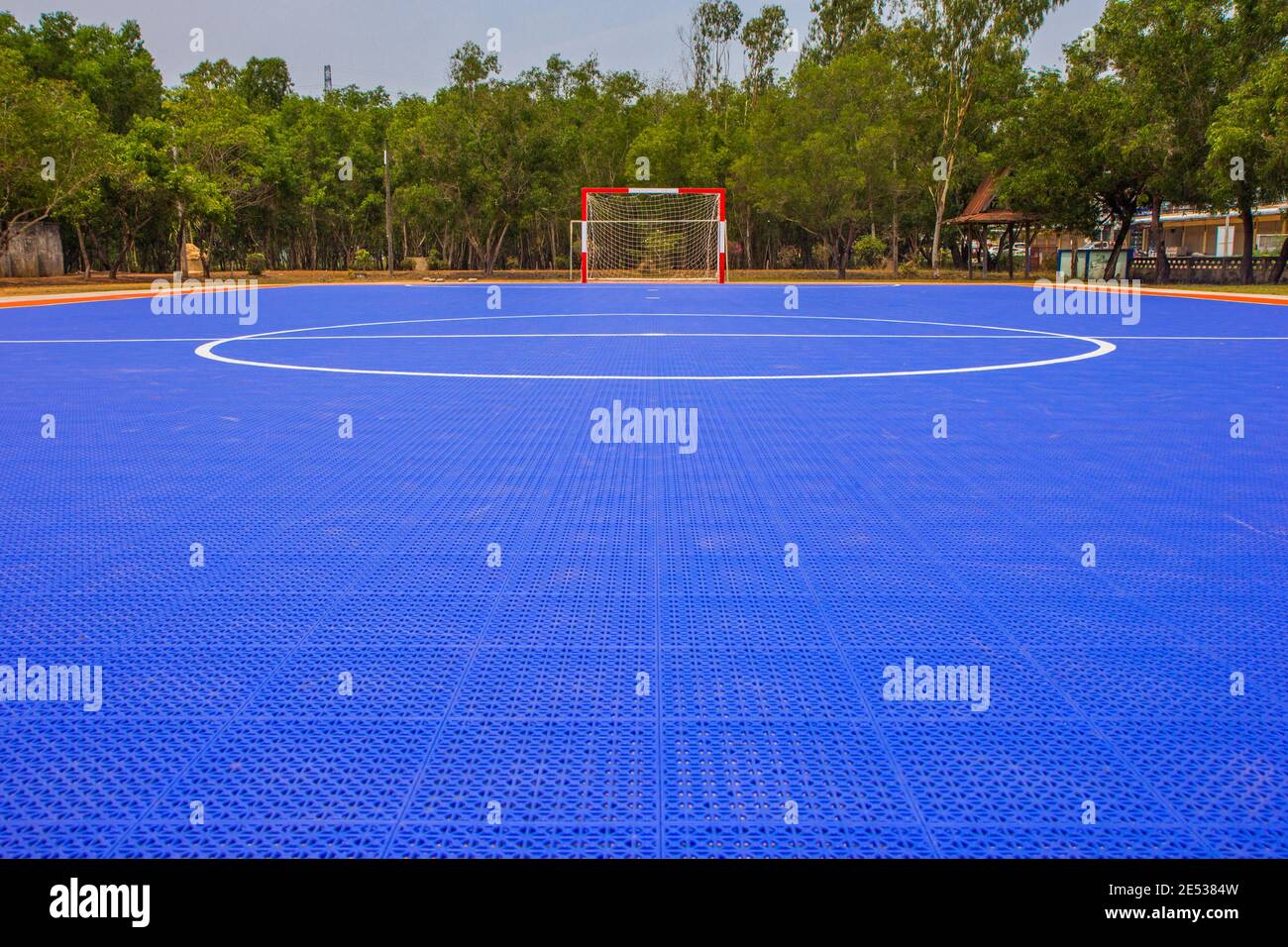 view of blue soccer field or football field Stock Photo - Alamy