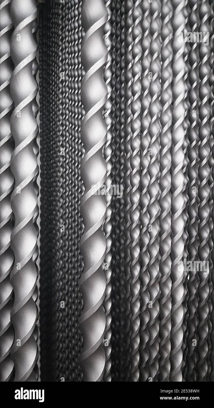 Close-up of a metal drill bit set vertical industry background Stock ...
