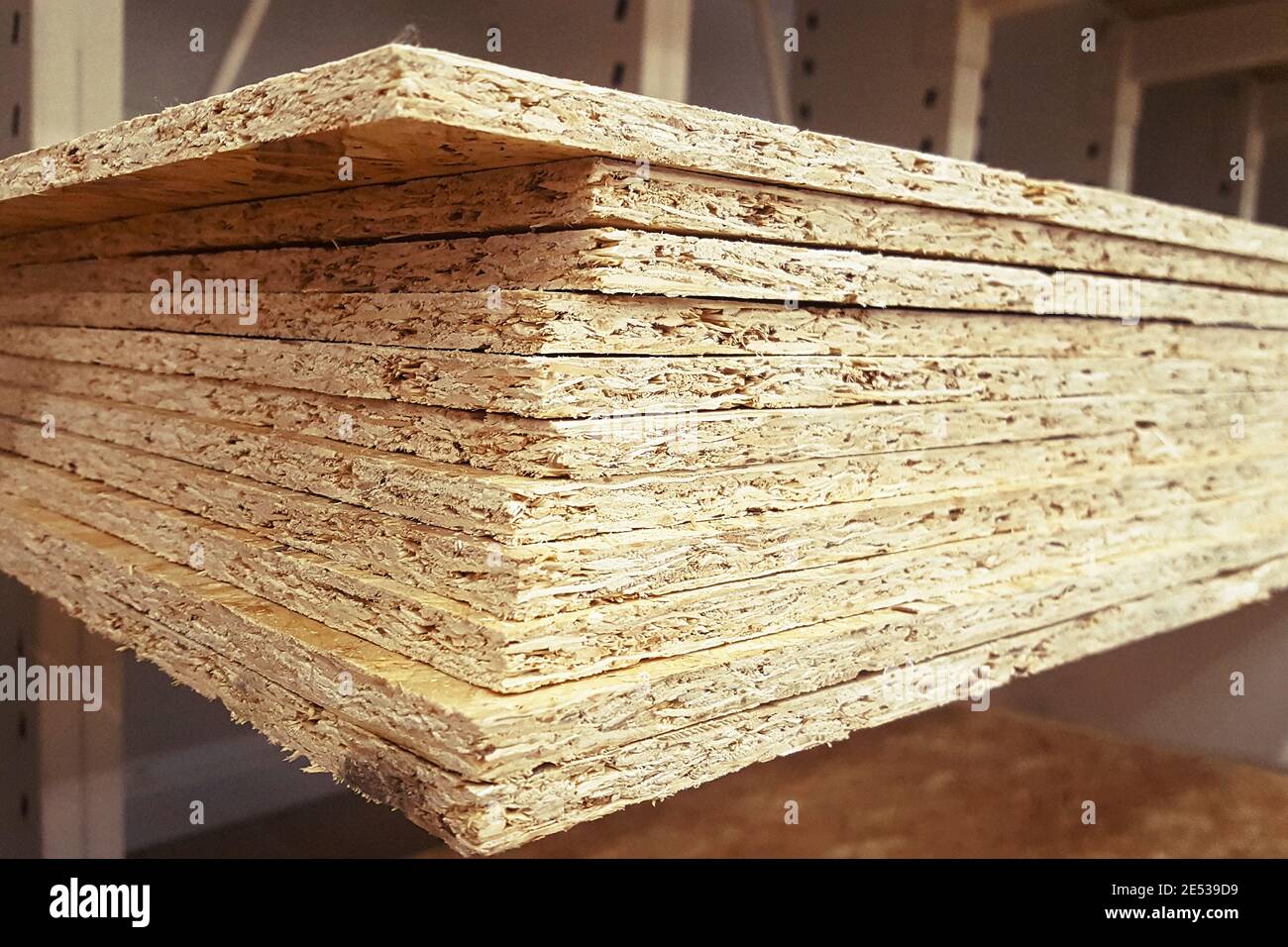 A stack of OSB sheets stacked is sold at the supermarket in the ...