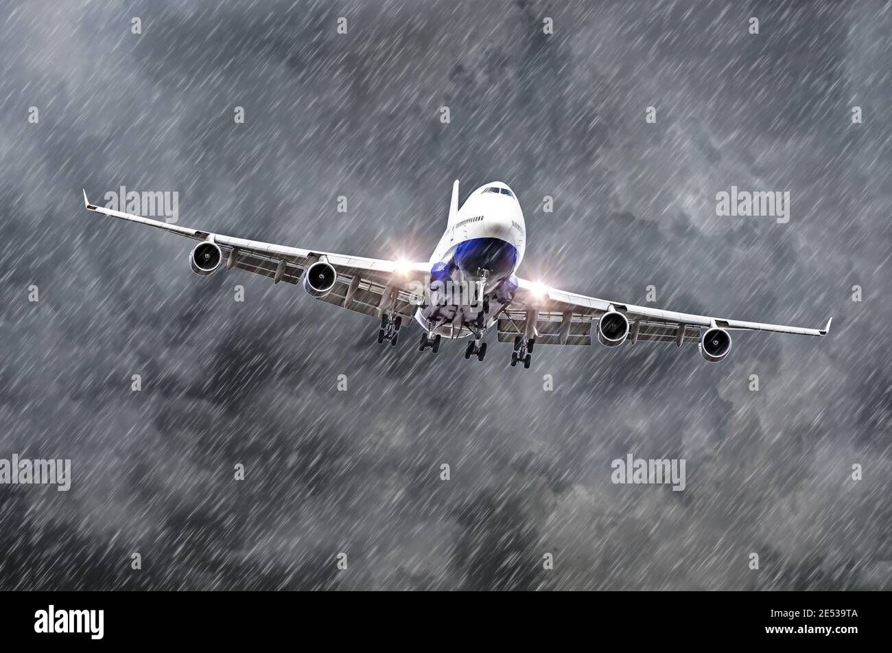 Large passenger airplane approaches the landing at the airport of rain ...