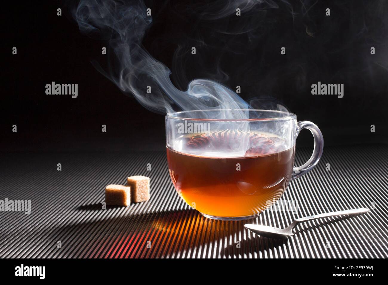 Morning tea cup with vapor on the black textured background Stock Photo ...
