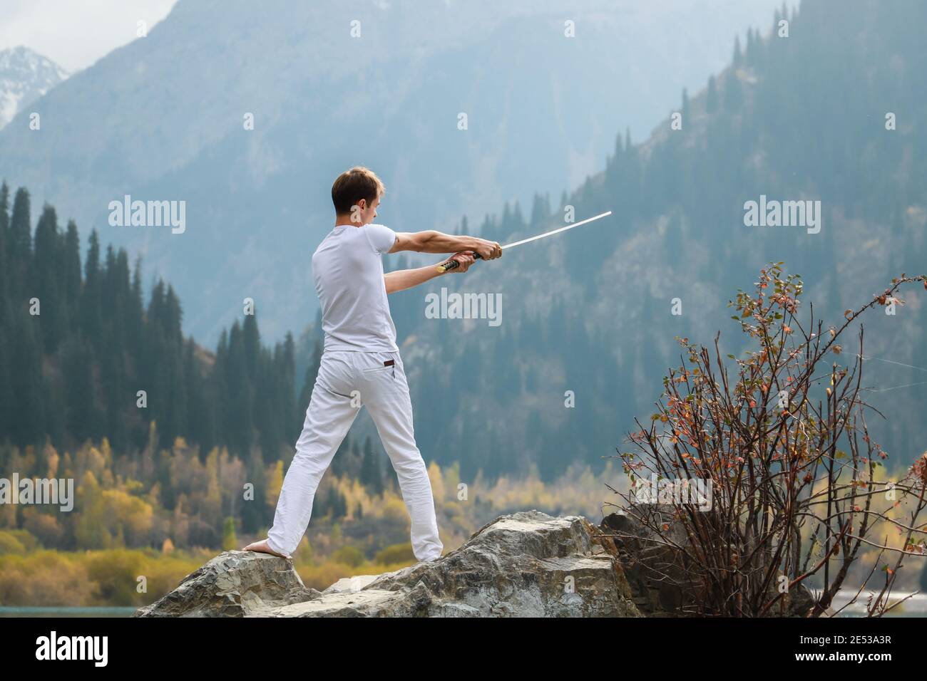 A man with a sword goes on the attack on the enemy. The emotional ...
