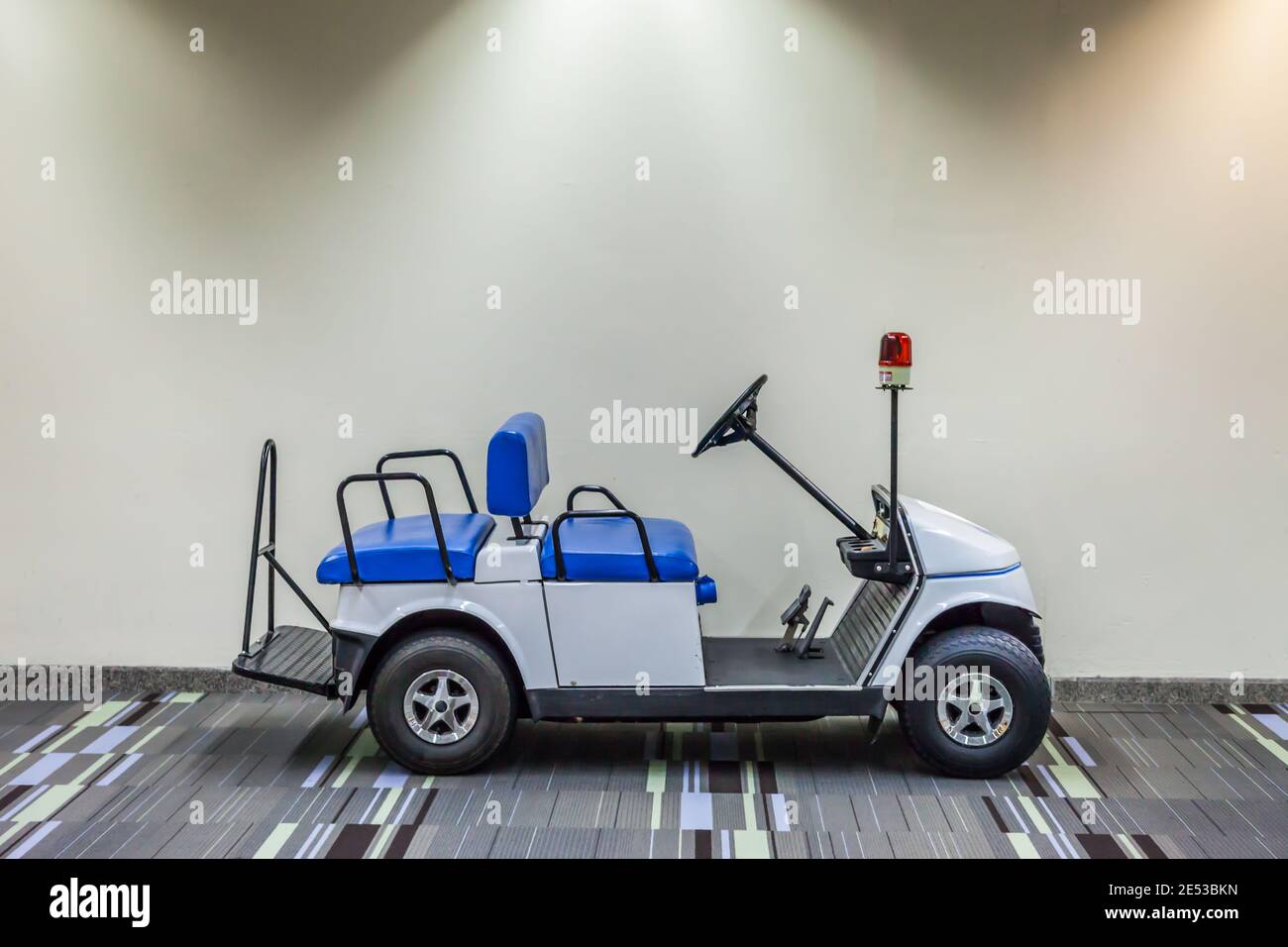 Electric Golf cart at the airport Stock Photo - Alamy
