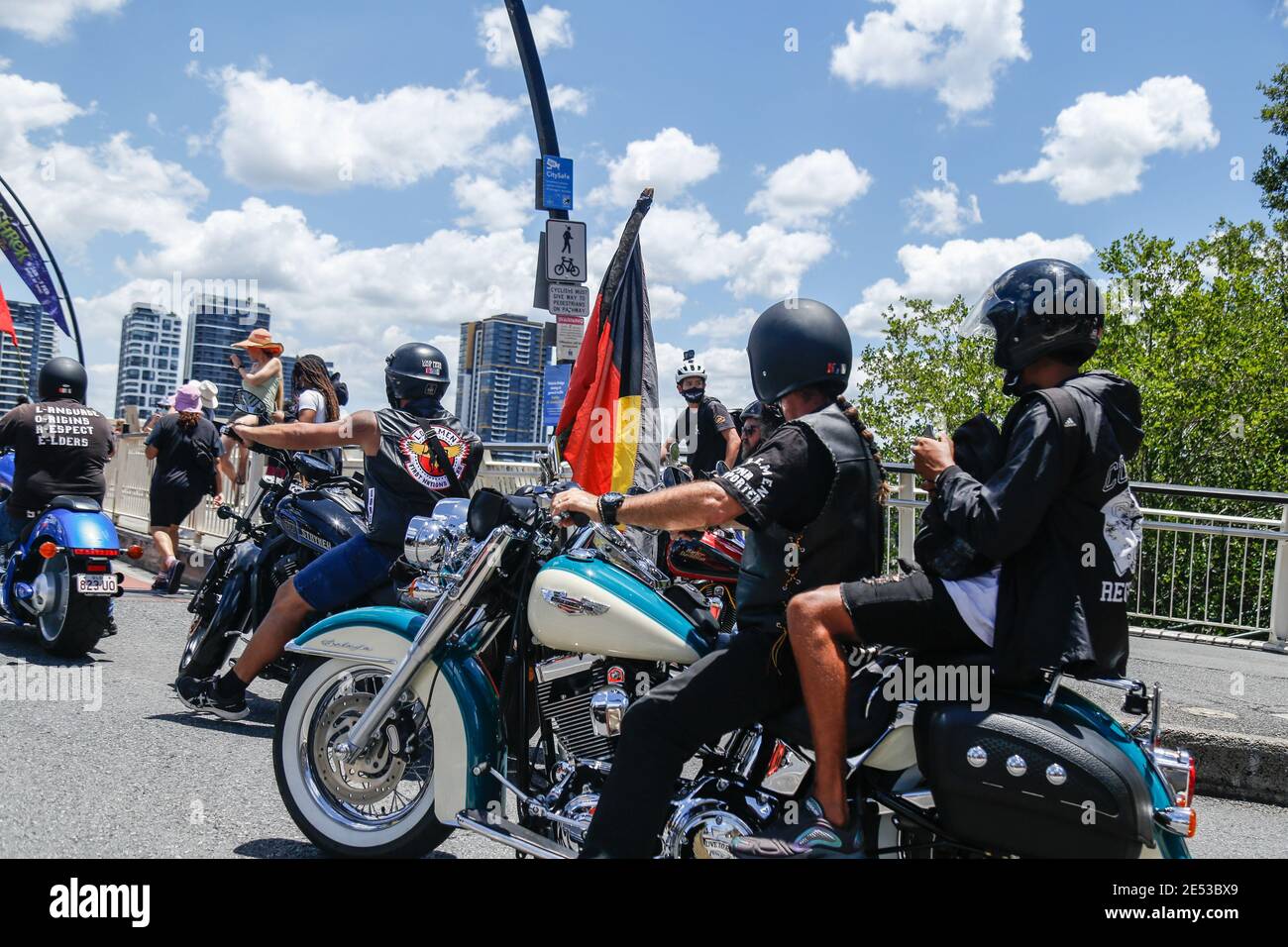 Members of the Indigenous Riders Club ride their motorcycles ride ...