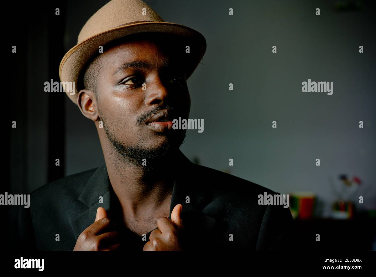 Vintage african man mafia model in black suit Stock Photo - Alamy