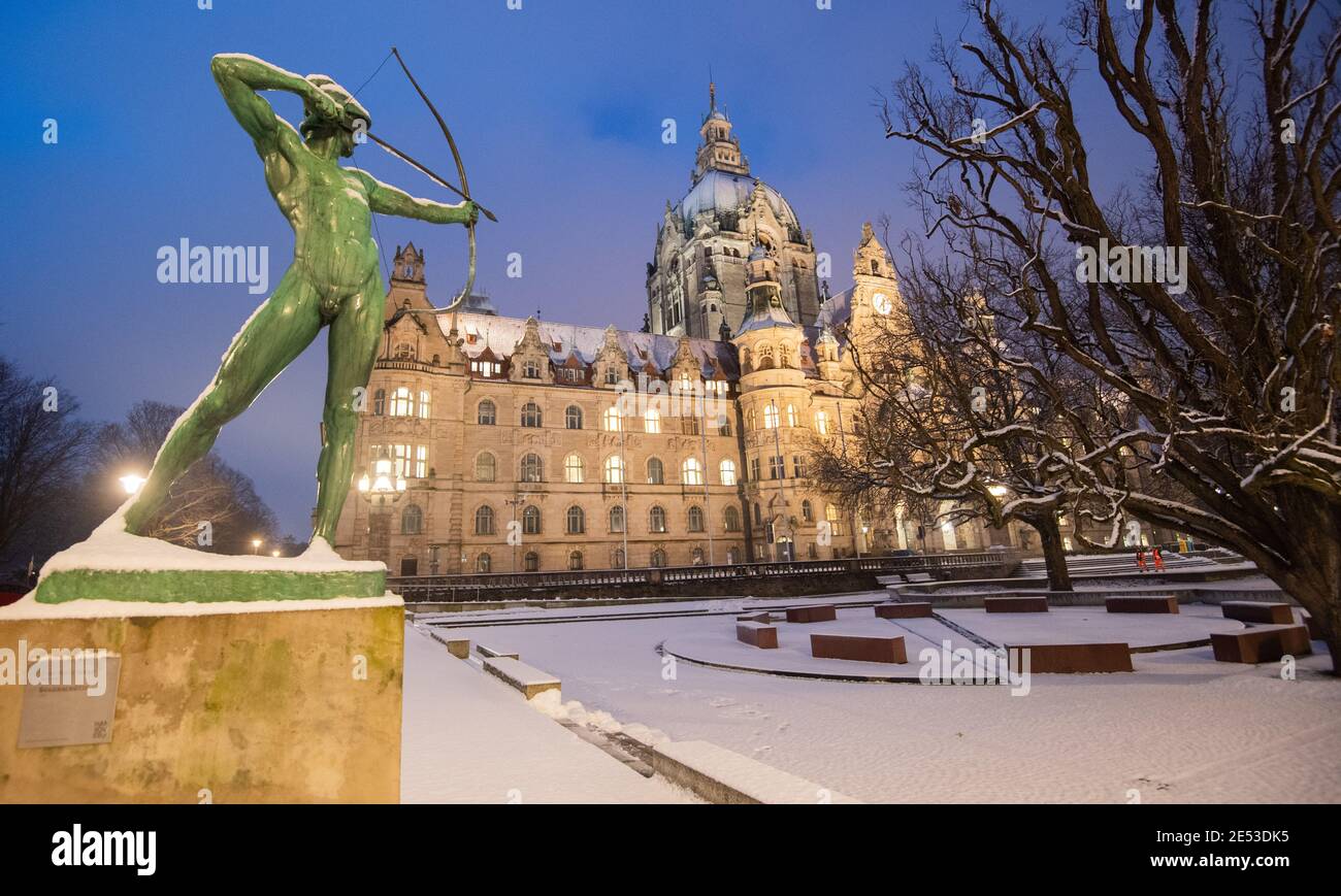 Hanover, Germany. 26th Jan, 2021. Snow lies around the New Town Hall ...