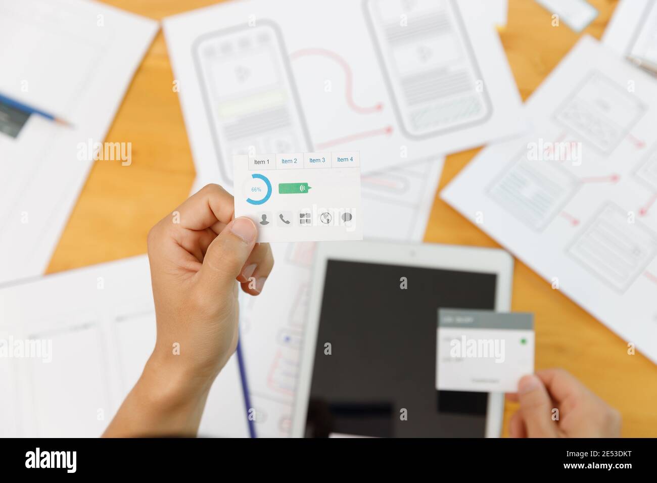 Graphic designers work together with UX UI designer planning ...
