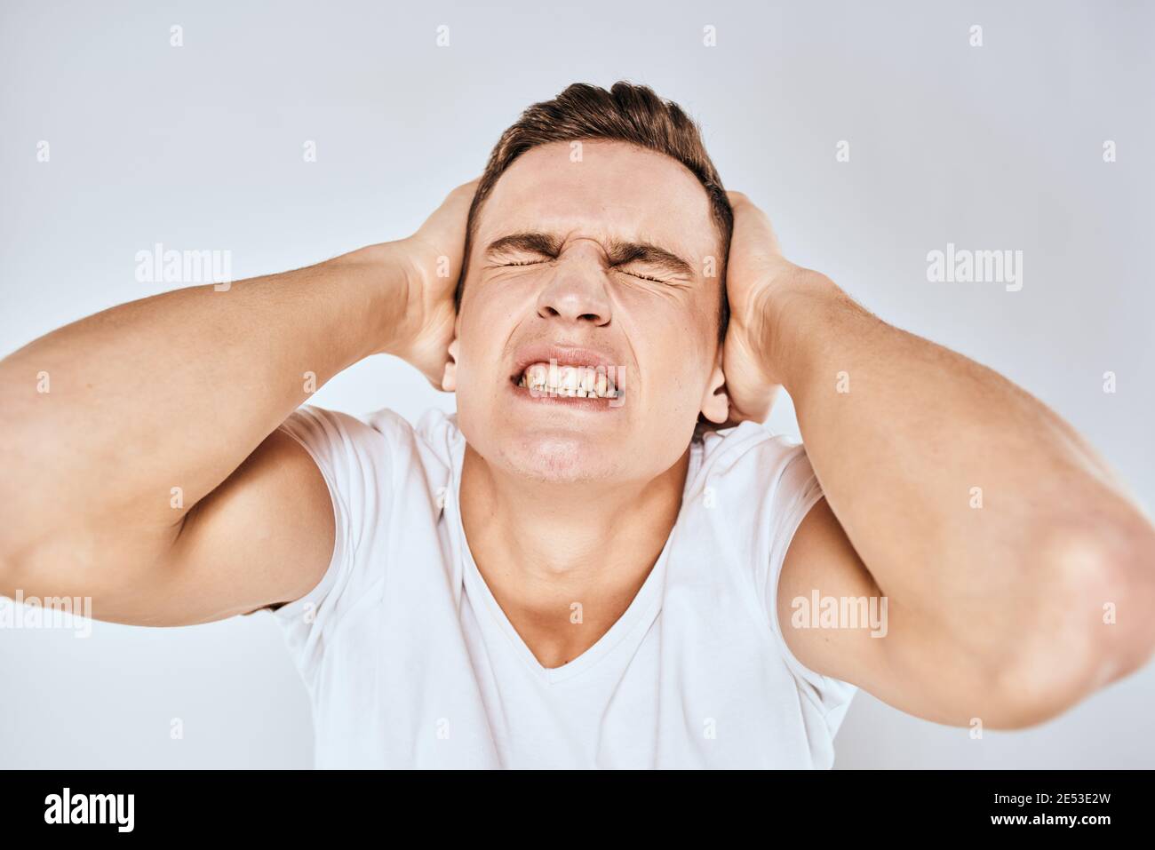 emotional man gesturing with his hands displeased facial expression ...