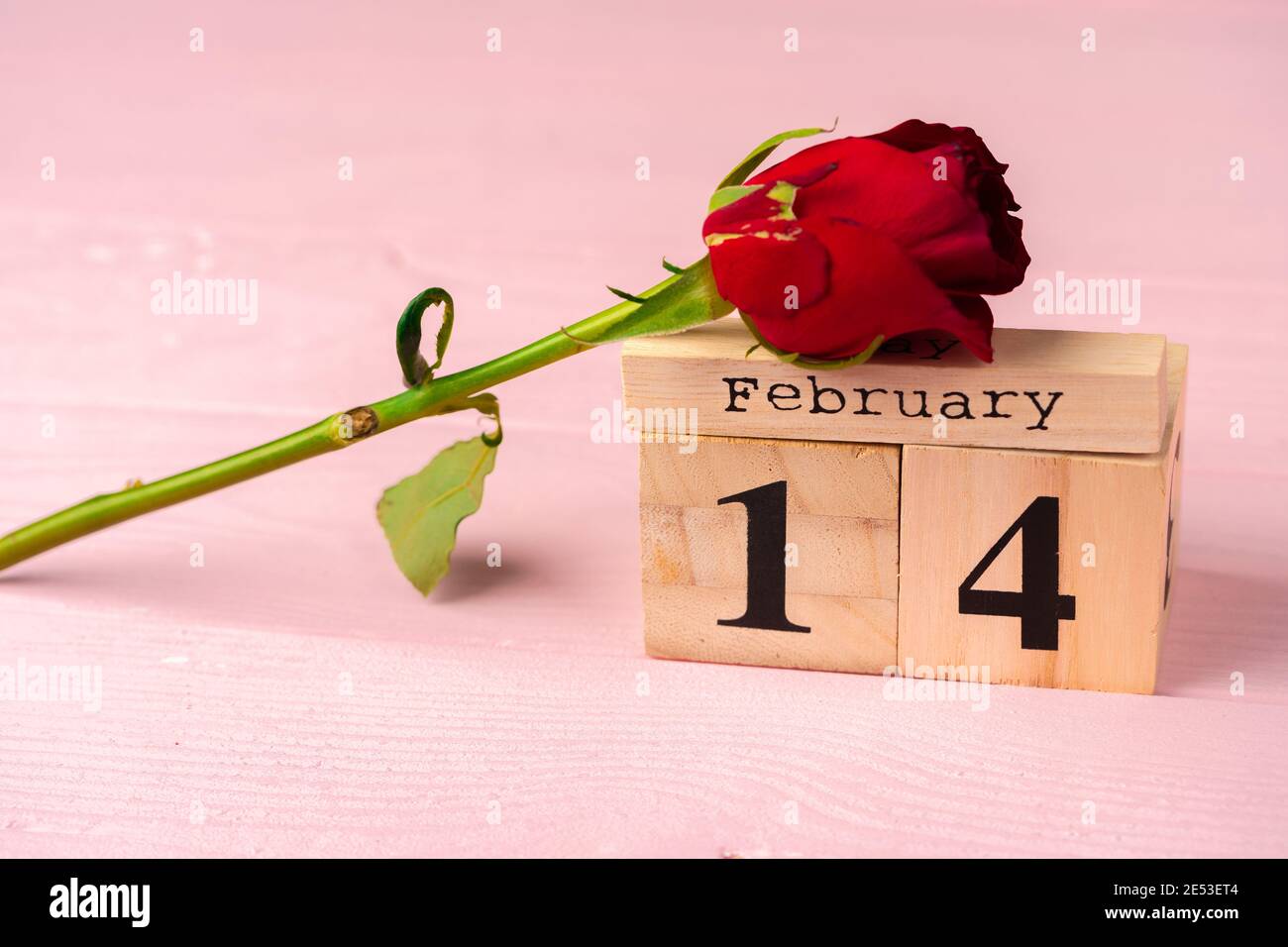 Wooden calendar with date 14th of February Stock Photo - Alamy
