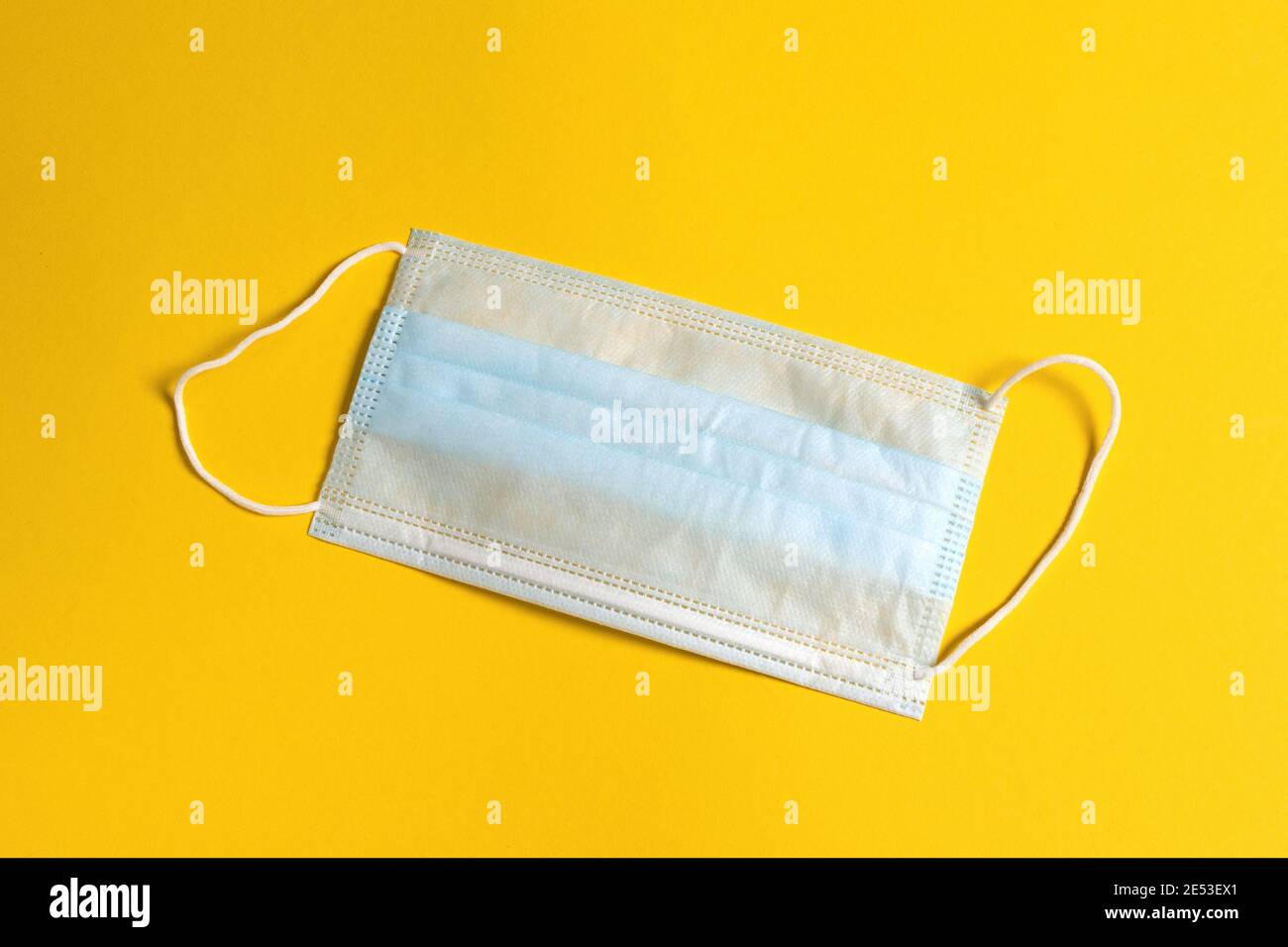 Surgical three-layer mask with rubber ear straps to protect against ...