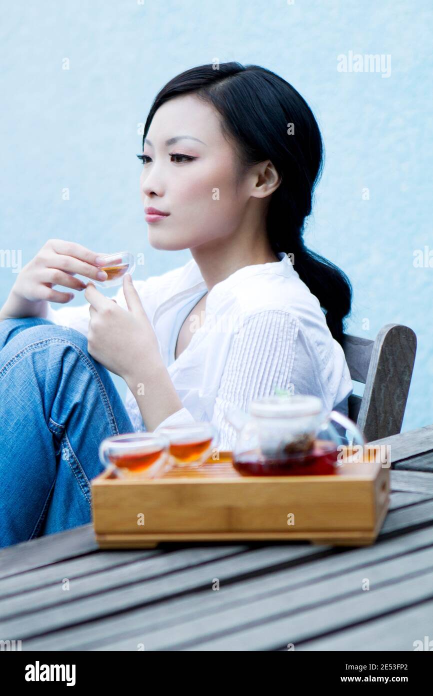 The young woman in the outdoor tea high quality photo Stock Photo - Alamy