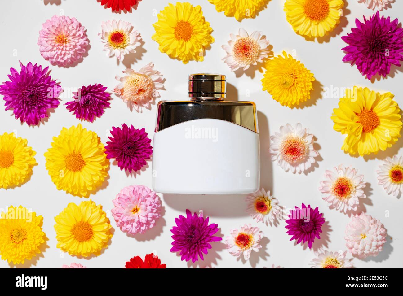 Perfume bottle for women in flower buds Stock Photo - Alamy