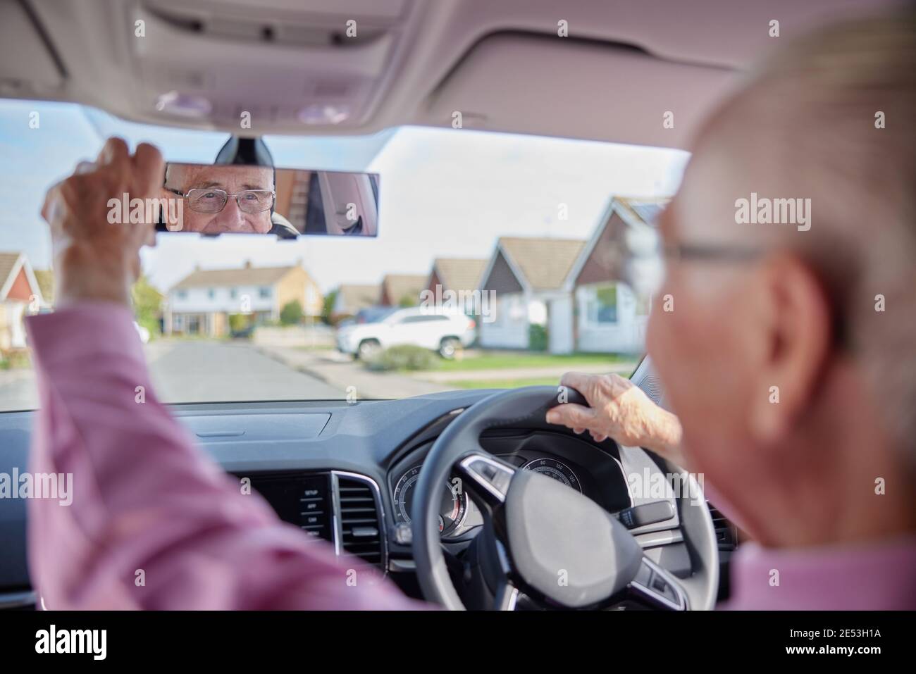 Man driving car mirror hi-res stock photography and images - Alamy