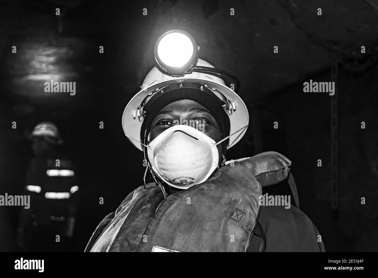 African woman miner helmet Black and White Stock Photos & Images - Alamy