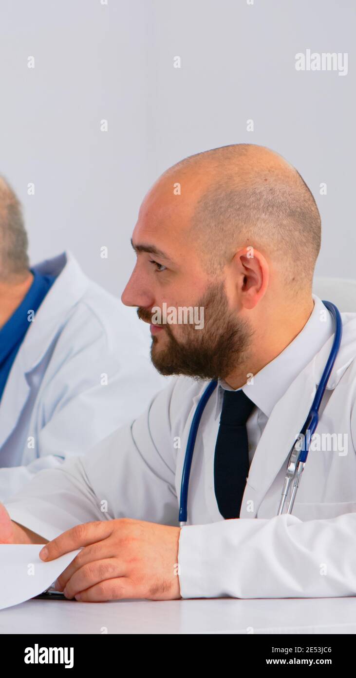 Brainstorming teamwork of physicians solving problems of patients in ...