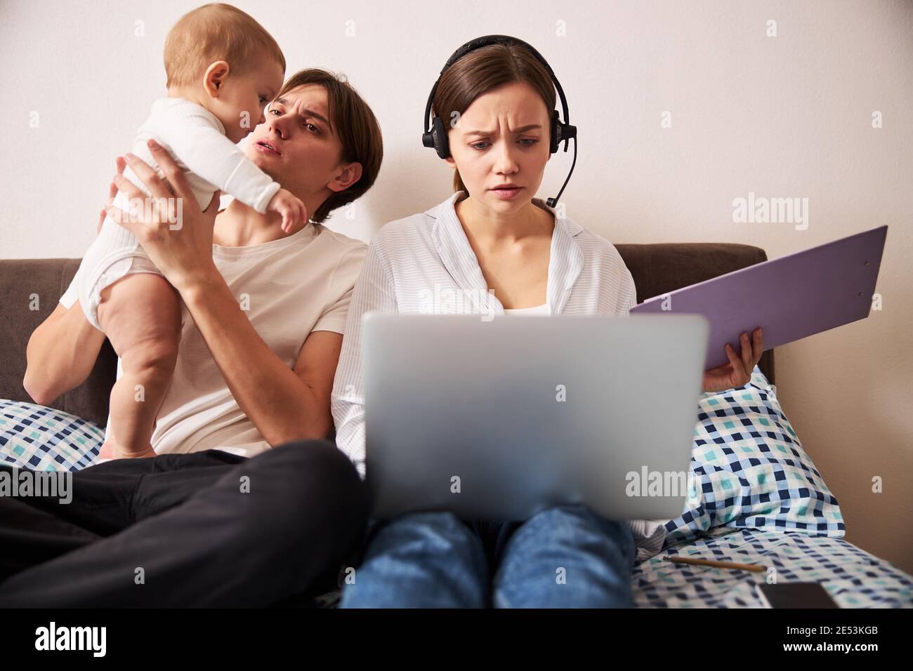 Kind baby boy attracting attention of parents Stock Photo - Alamy