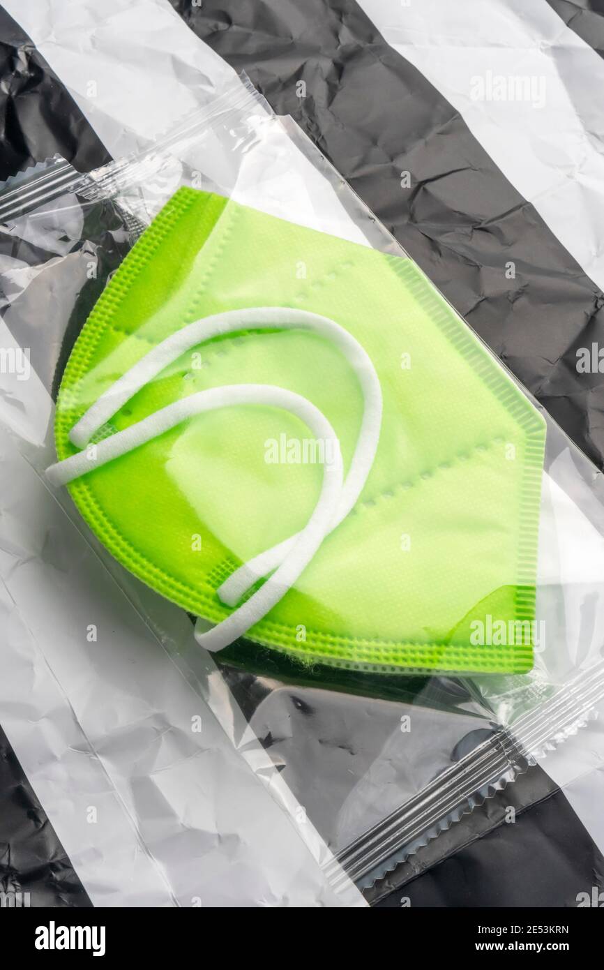KN95 professional protective respiratory mask in transparent packaging ...