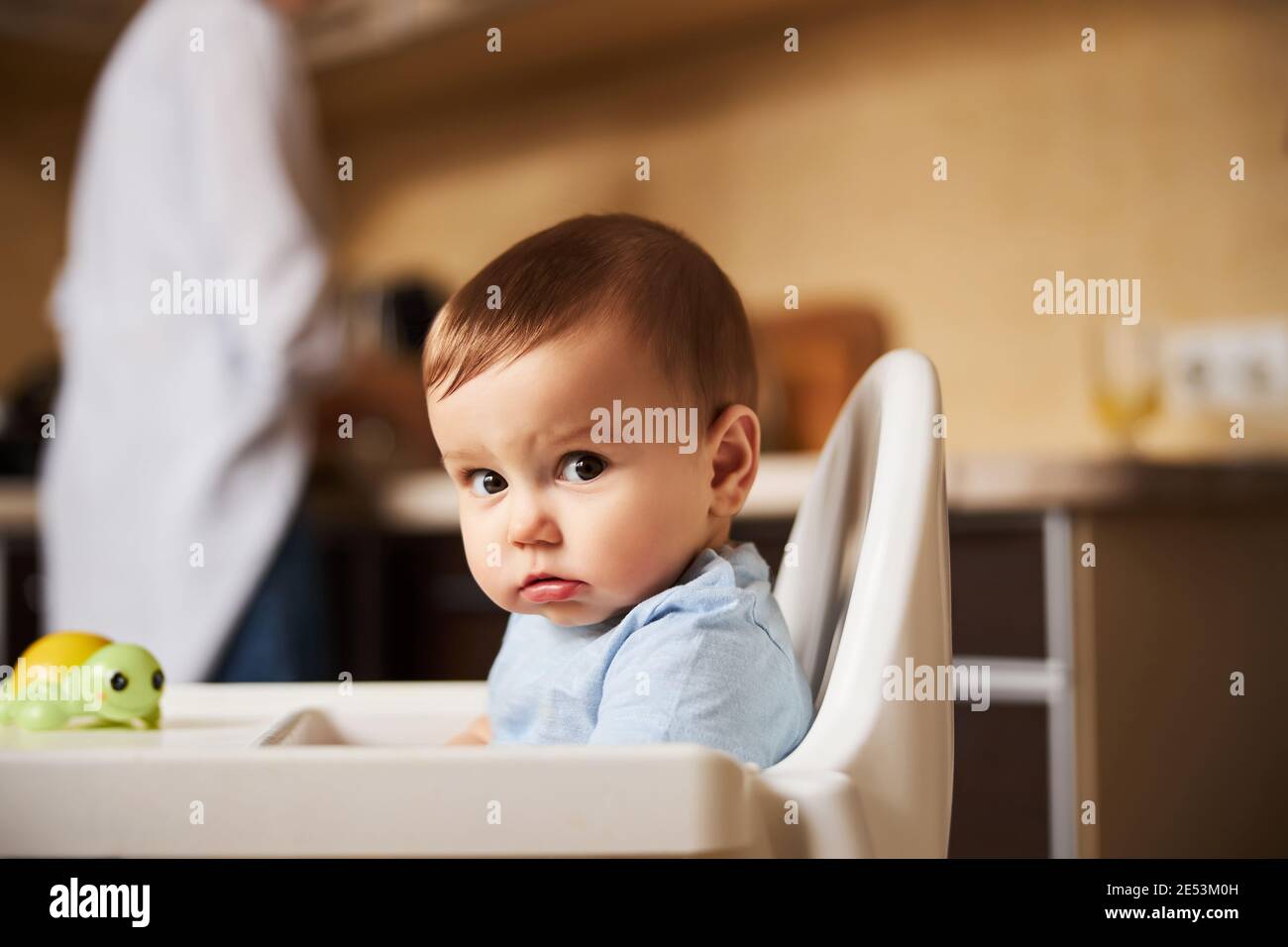 Portrait of serious child posing on camera Stock Photo - Alamy