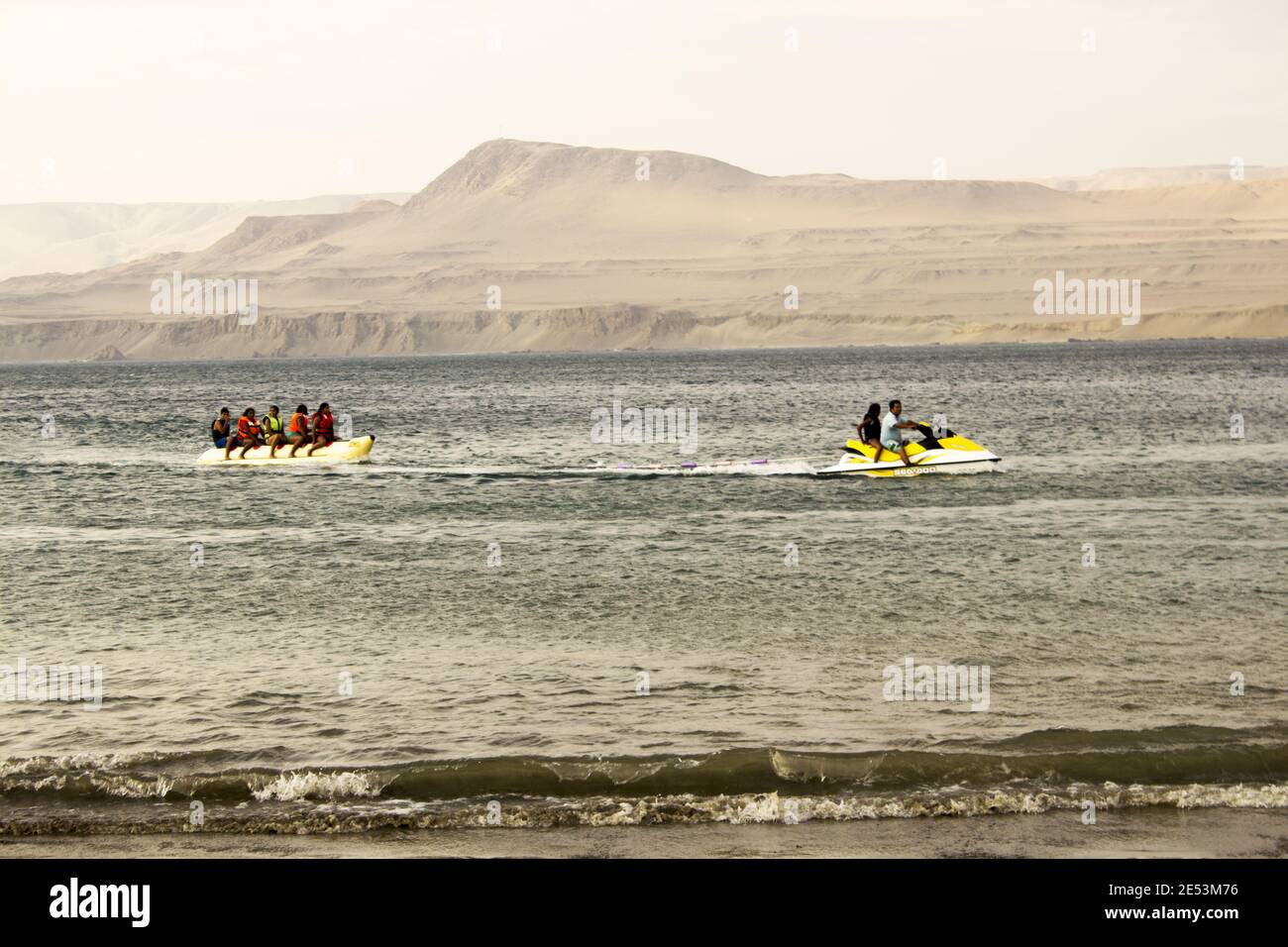 SAN JUAN DE MARCONA, PERU - Jan 15, 2015: A group of people trying the ...