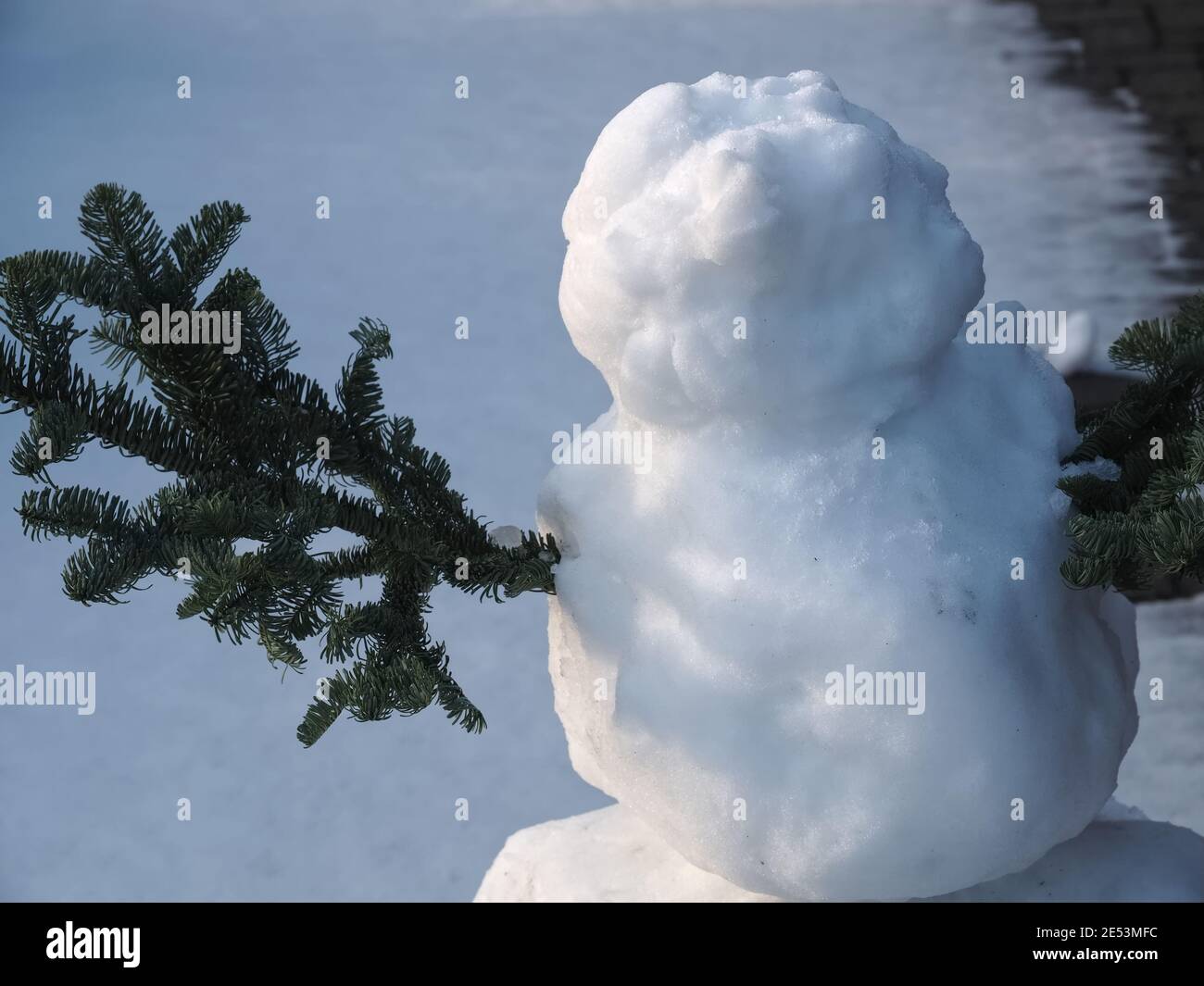 Cute snowman built by children Stock Photo - Alamy