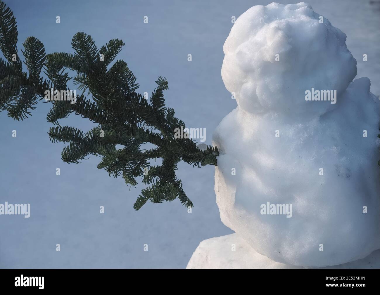 Cute snowman built by children Stock Photo - Alamy