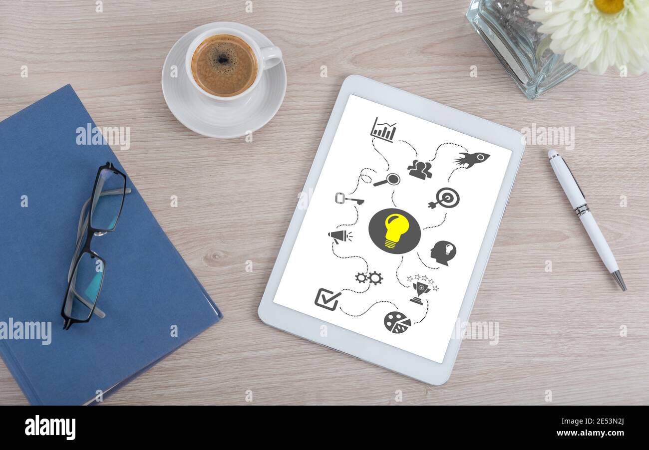 Top view of a desk with business idea concept on a digital tablet Stock ...