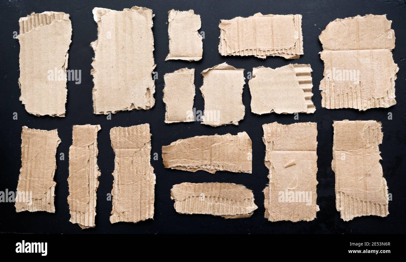 Cardboard scraps isoalted on white background Stock Photo - Alamy