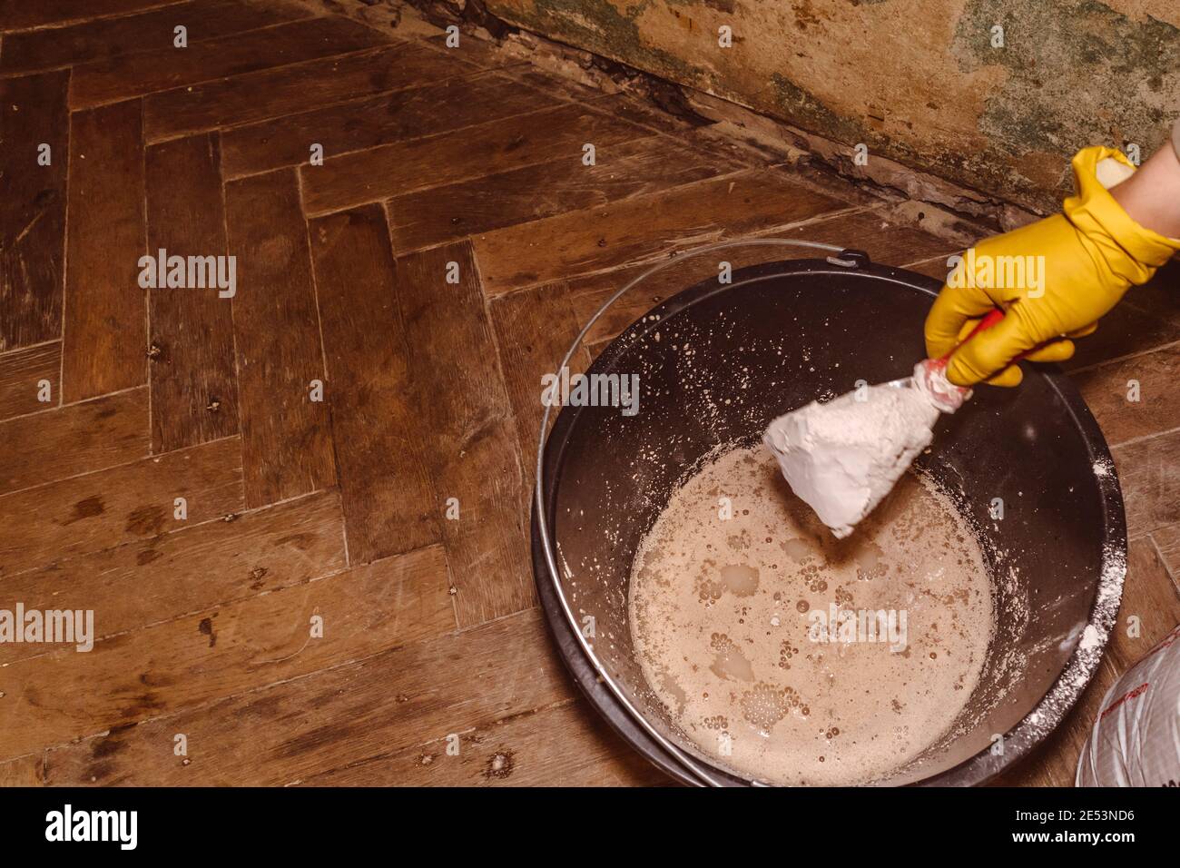 preparing a mortar plaster stirring mix water consistency emulsion ...