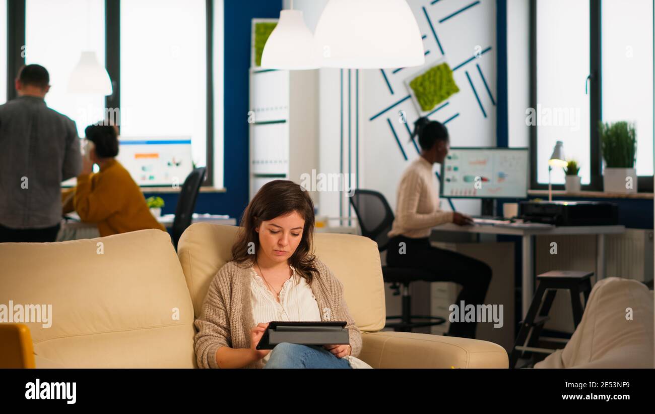 Diverse employees working in modern strat up office in cozy decor ...
