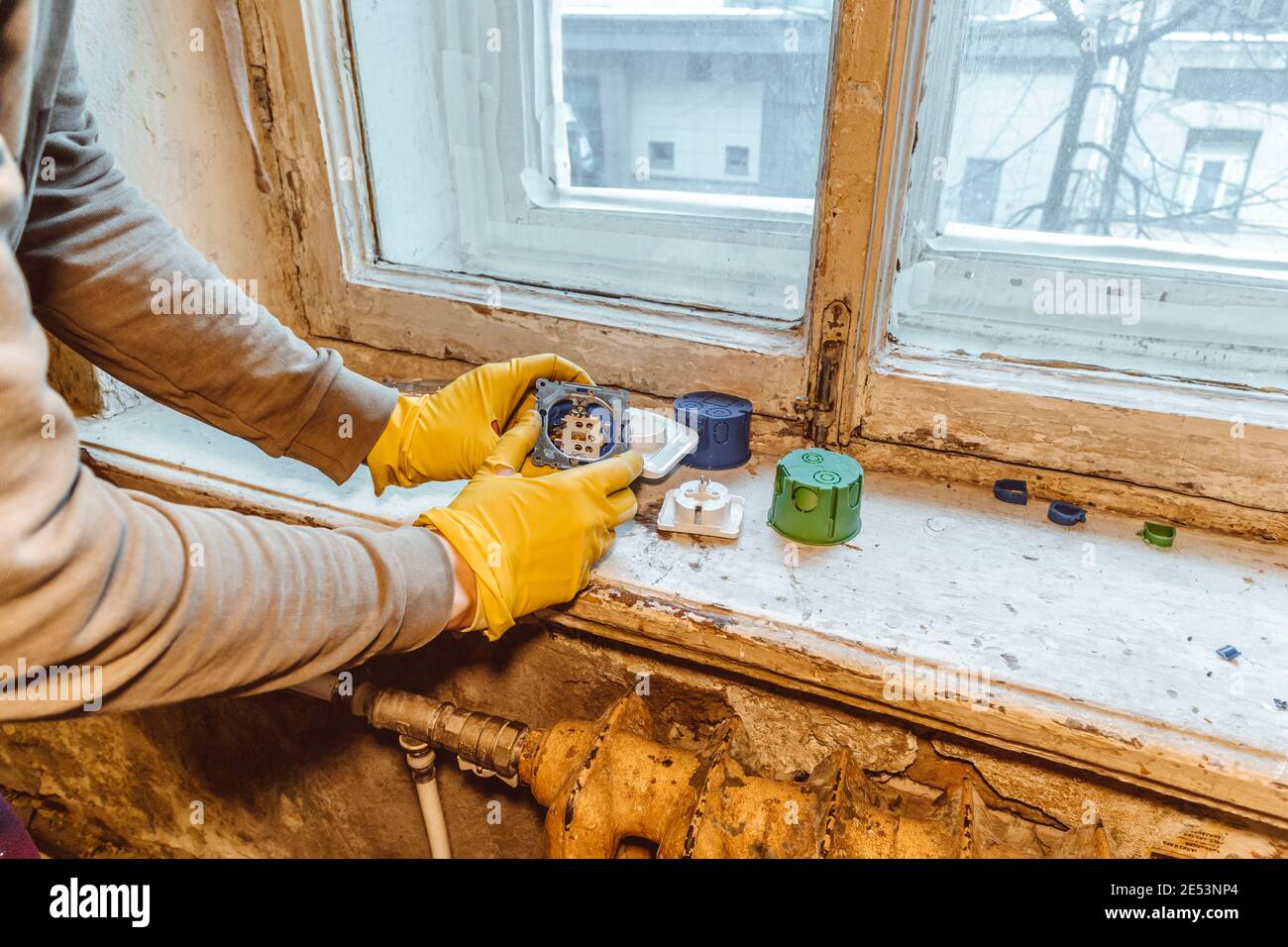 electrician worker voltage work replacing the socket new cable plug ...