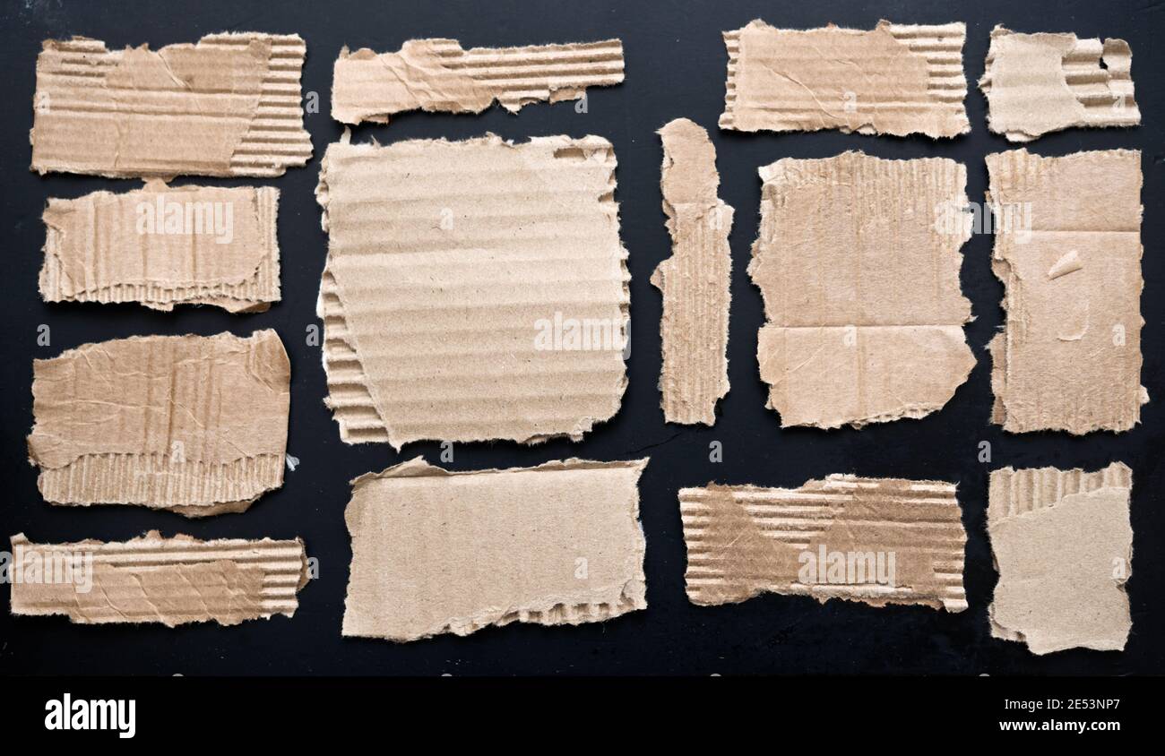 Cardboard scraps isoalted on white background Stock Photo - Alamy