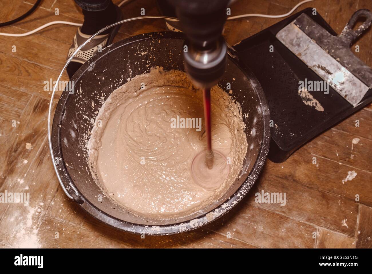 preparing a mortar plaster stirring mix water consistency emulsion ...
