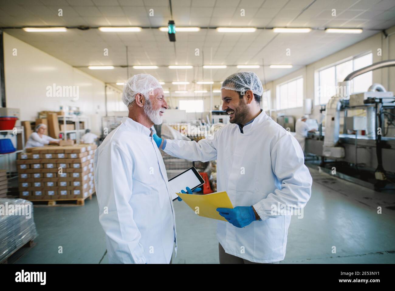 Corporate employees uniform hi-res stock photography and images - Alamy