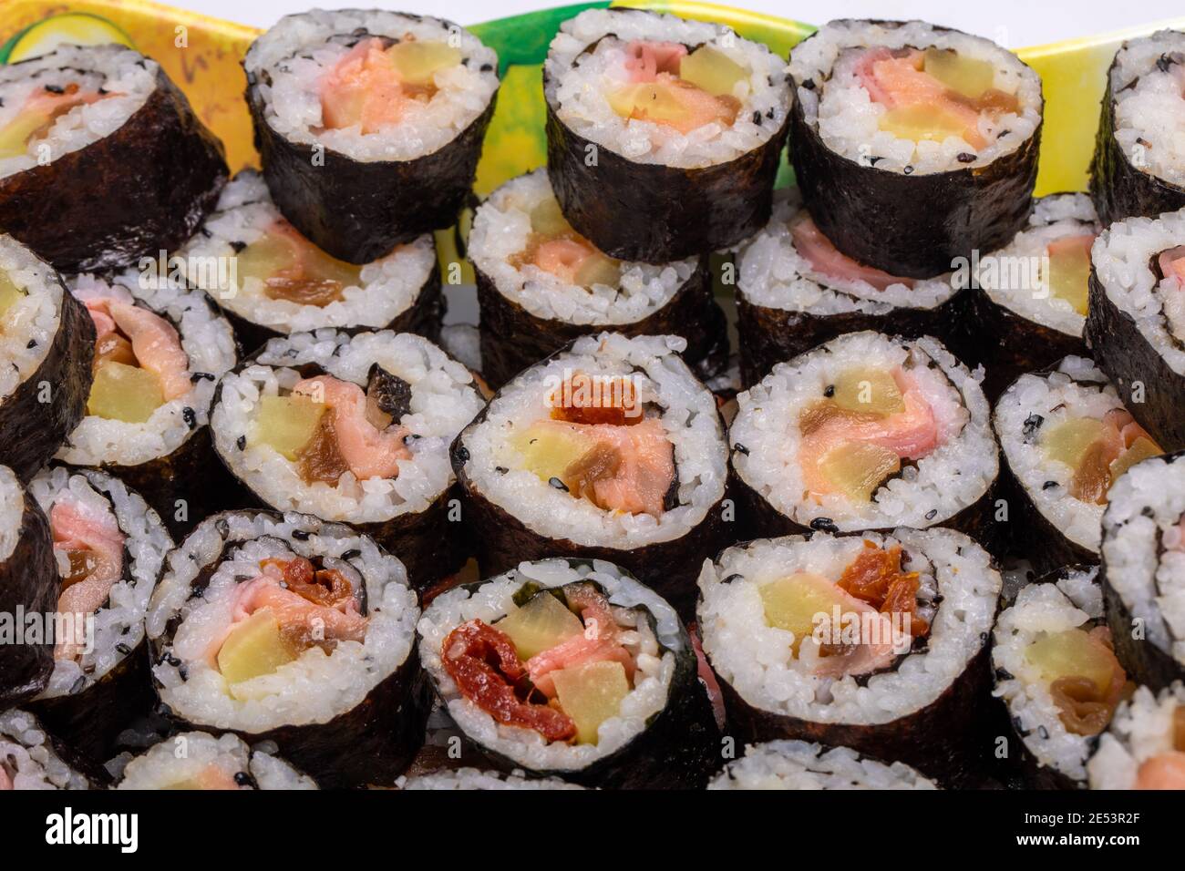 Top view of stack of Japanese sushi maki roll plate. Served in Japanese ...