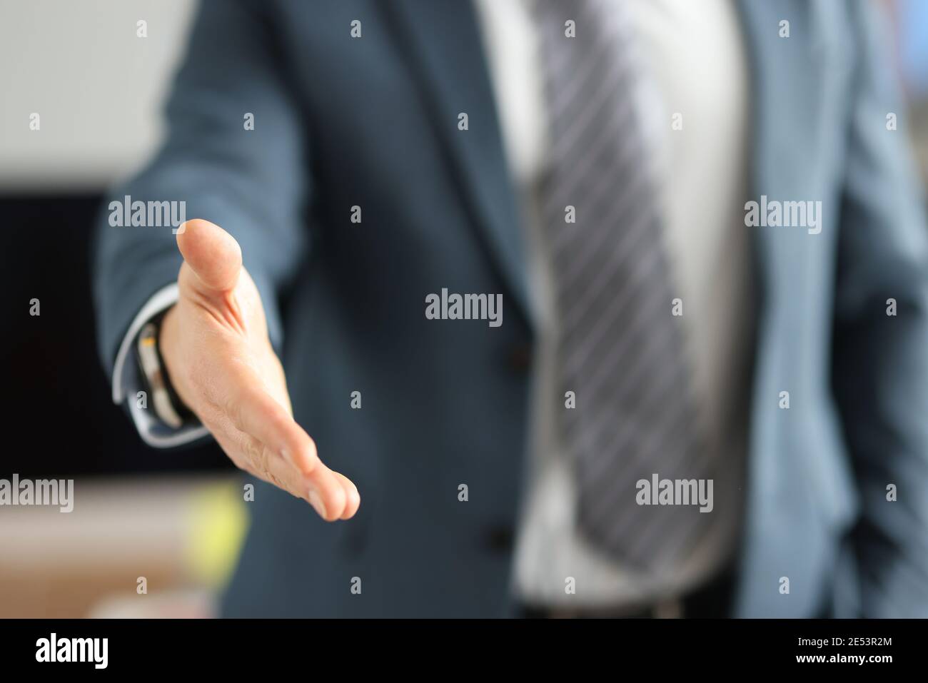 Man in business suit giving his hand for handshake closeup Stock Photo ...