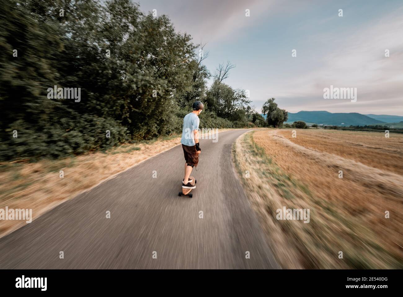 Riding skateboard man hi-res stock photography and images - Alamy