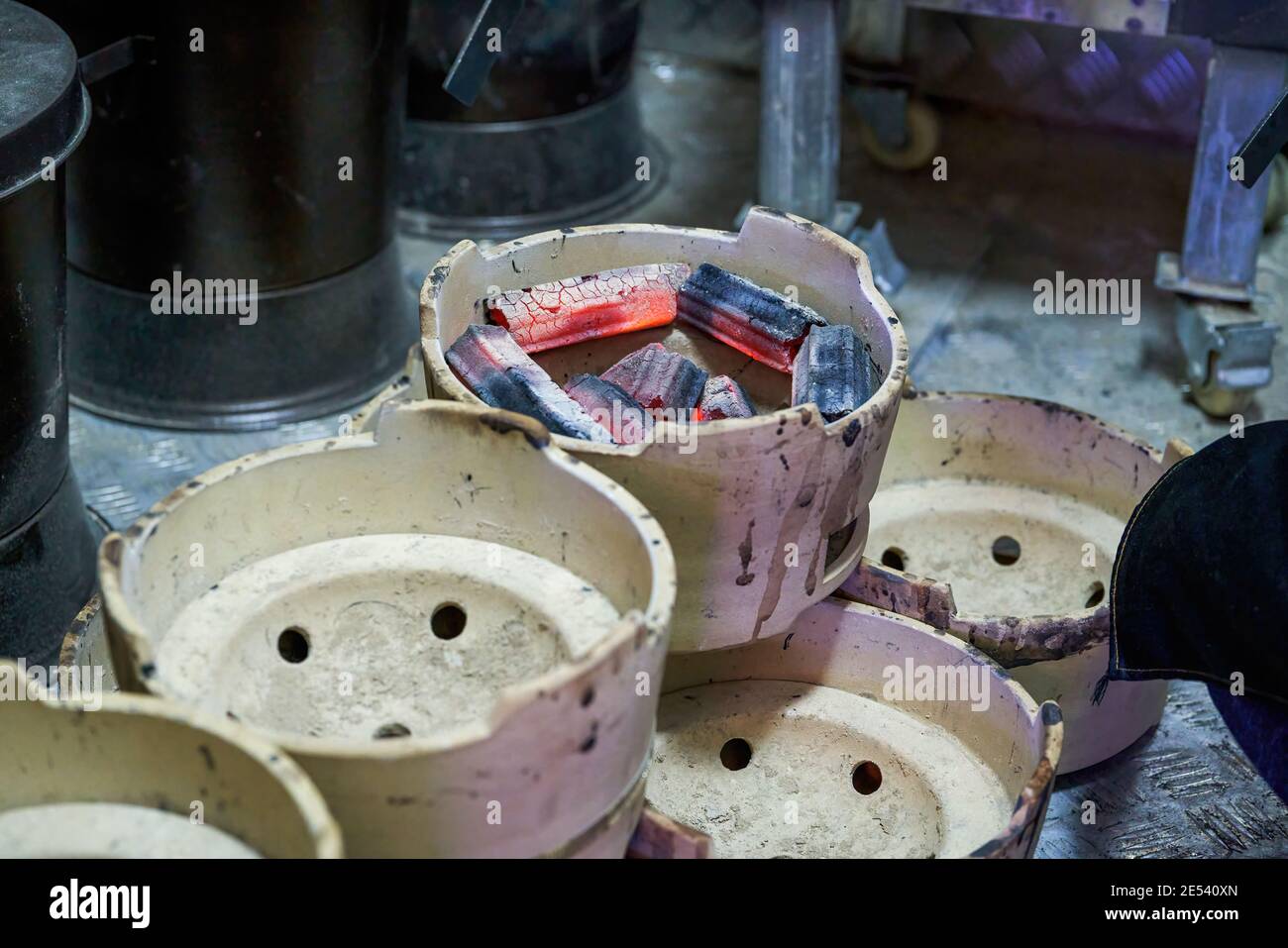 Burning charcoal fire and carbon stove Stock Photo - Alamy