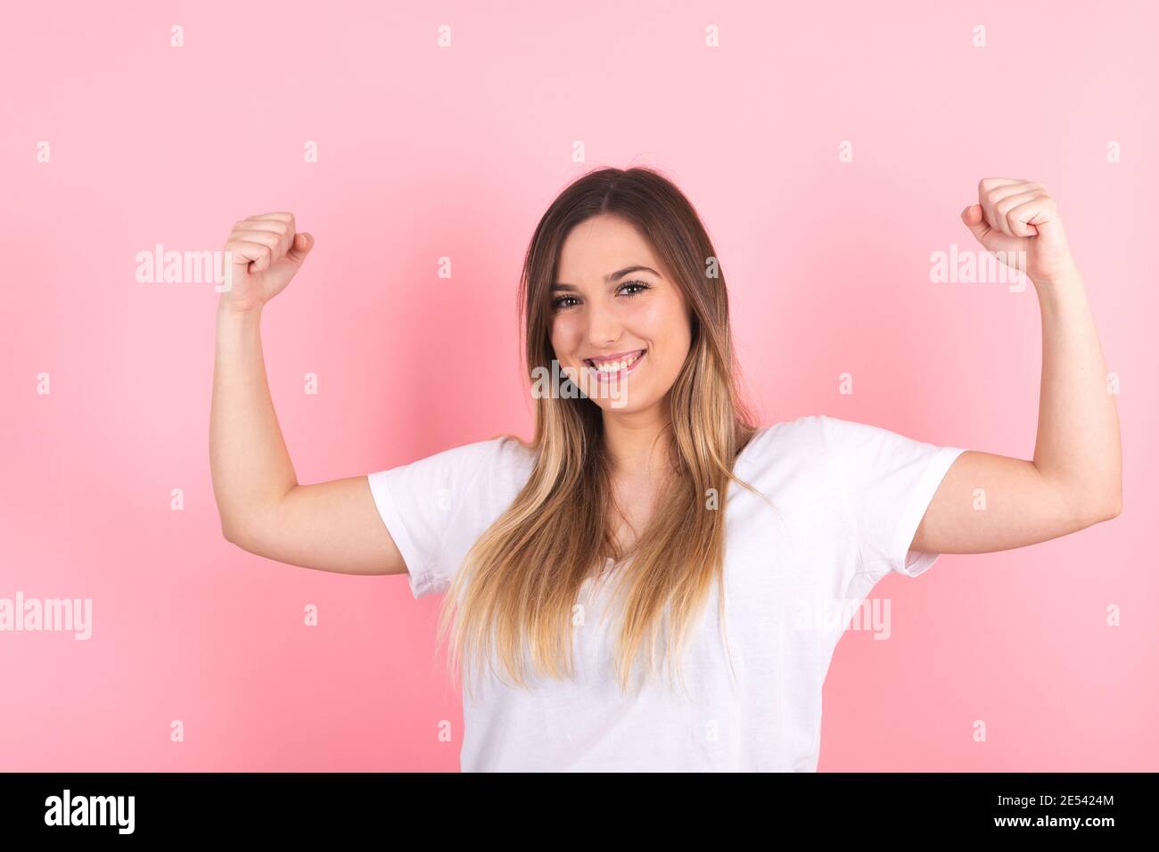 young woman demonstrating her strength. Concept of female power Stock ...