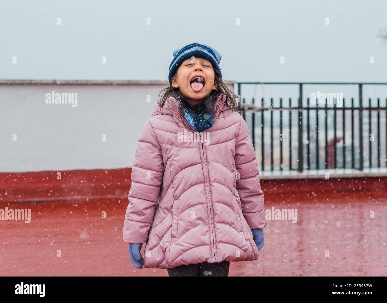 Catch a snowflake on your tongue hi-res stock photography and images ...