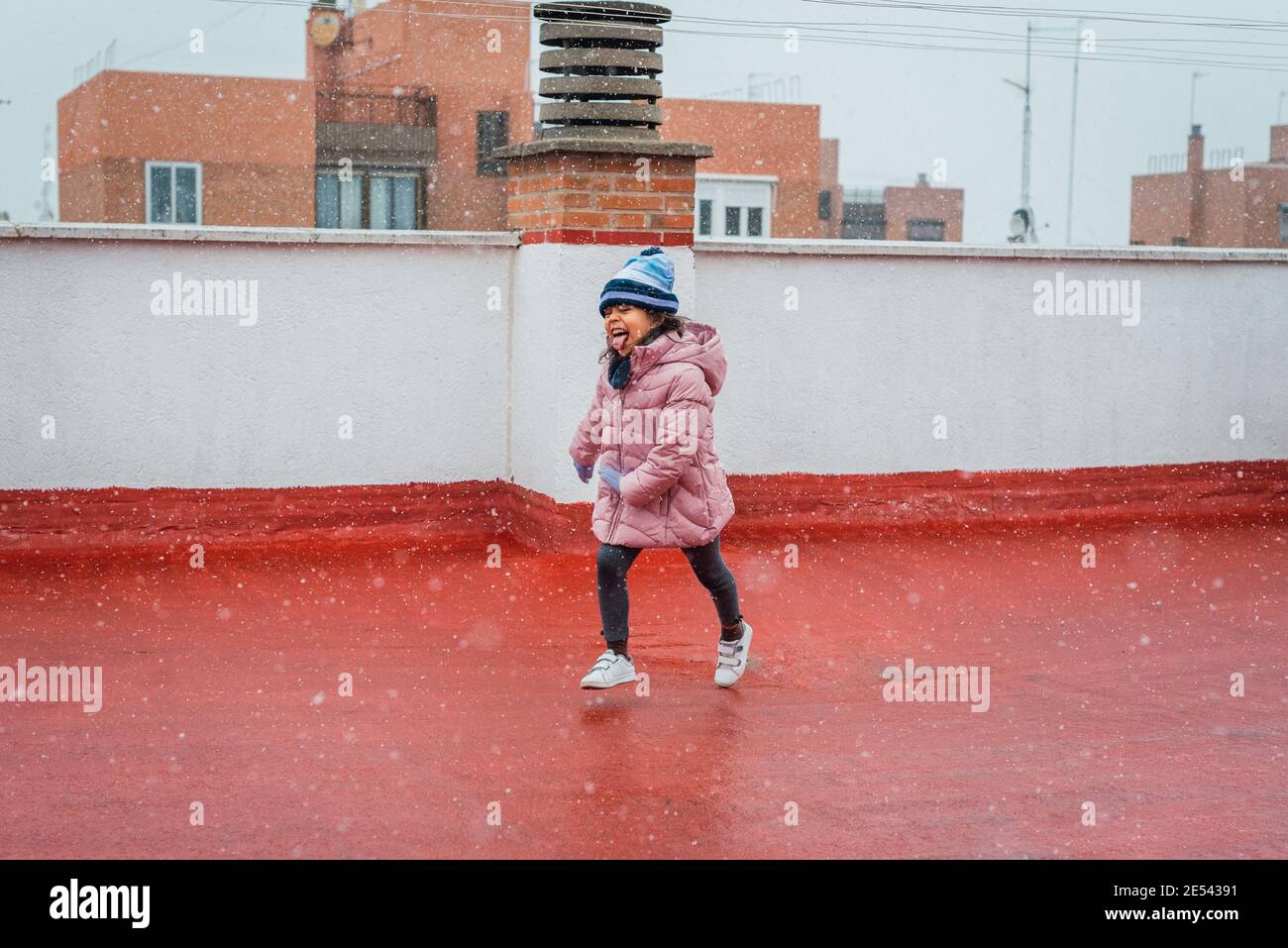 Girl Catching Snowflakes Tongue High Resolution Stock Photography and ...