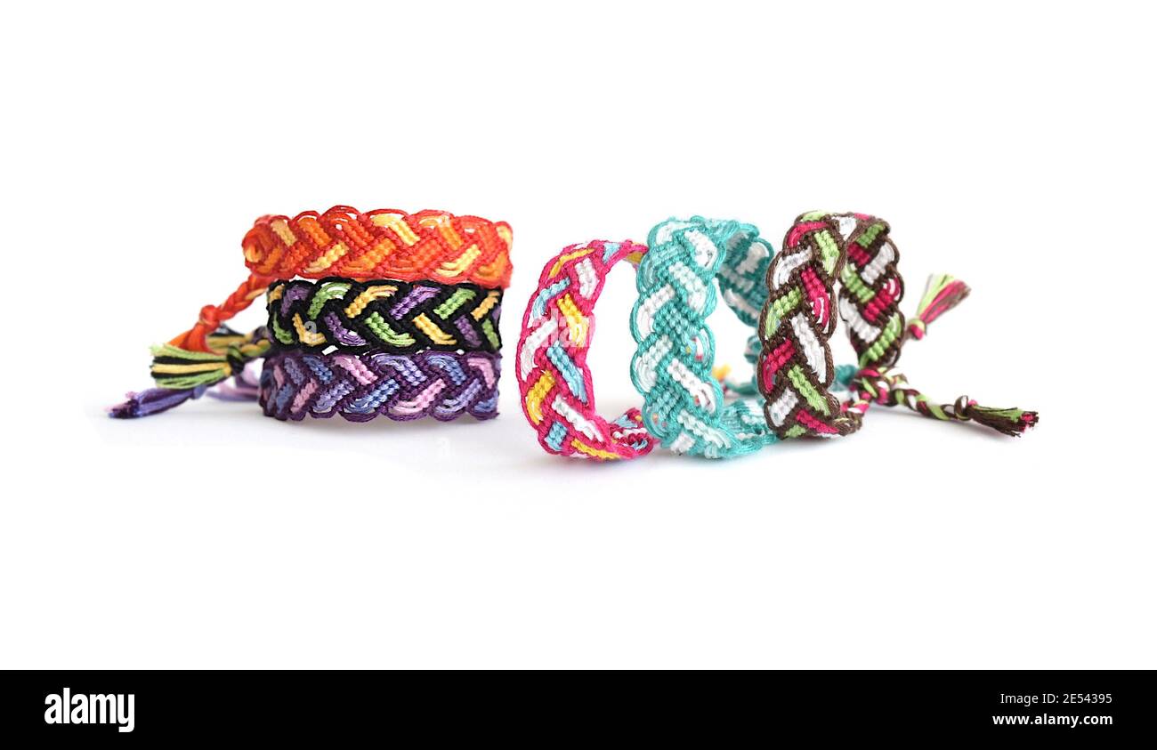 Selective focus of multi-colored woven DIY friendship bracelets Pigtail ...