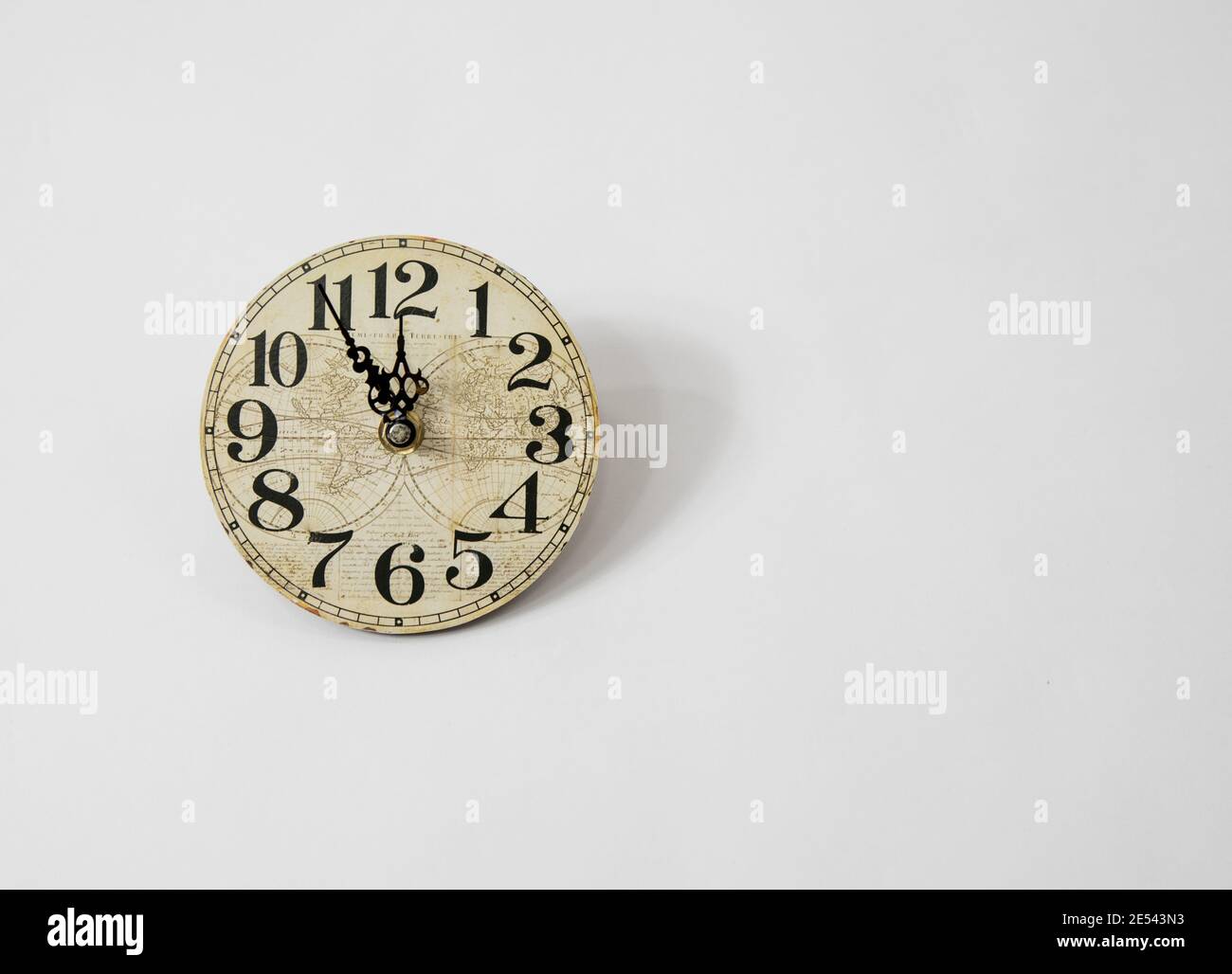Old vintage wall clock on a white background Stock Photo - Alamy